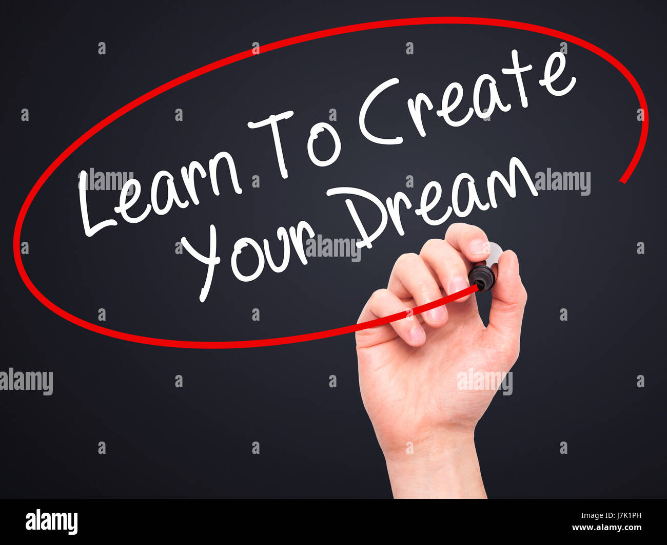 Man Hand writing Learn To Create Your Dream with black marker on visual ...