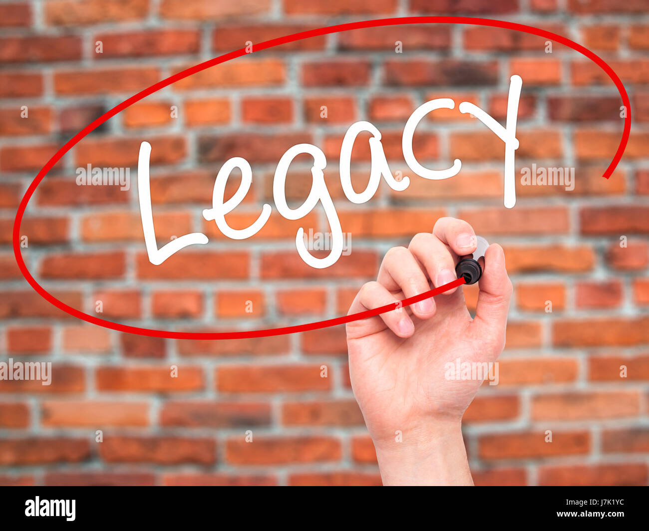 Man Hand writing Legacy with black marker on visual screen. Isolated on ...