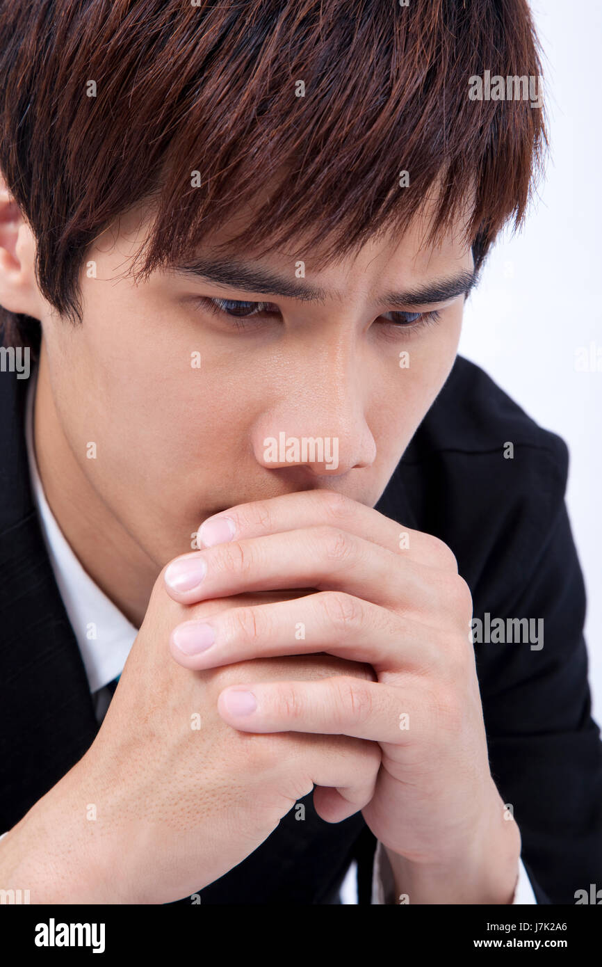 Young thinking praying sad man face drpressed hi-res stock photography ...