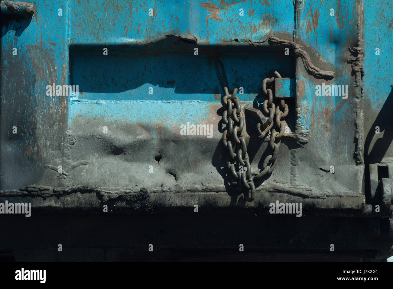 Back of weathered, rusty, garbage, trash truck., with chain Stock Photo ...
