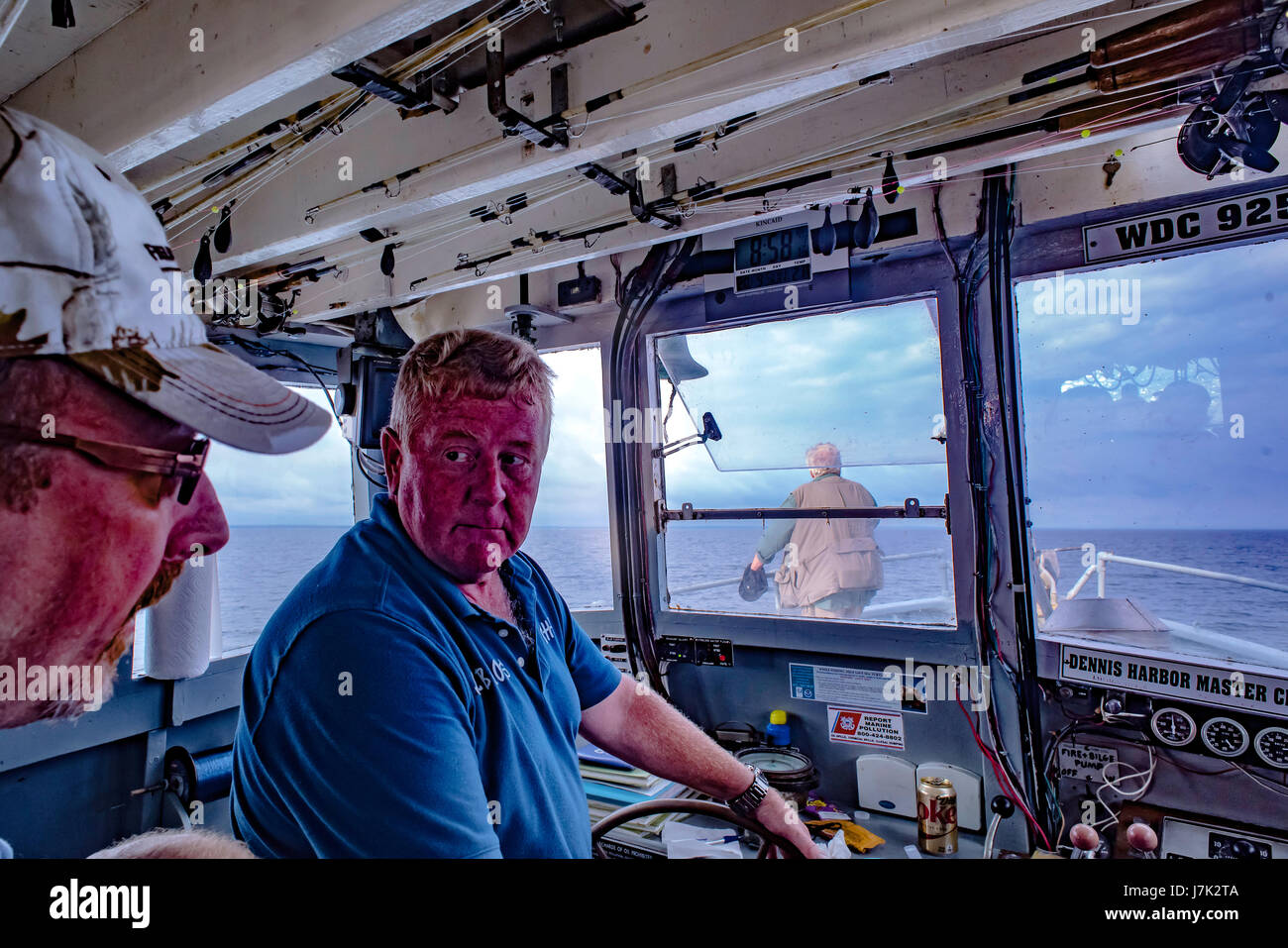 captain, mate, crew on fishing boat Stock Photo - Alamy
