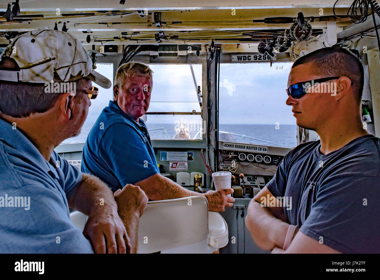 captain, mate, crew on fishing boat Stock Photo - Alamy