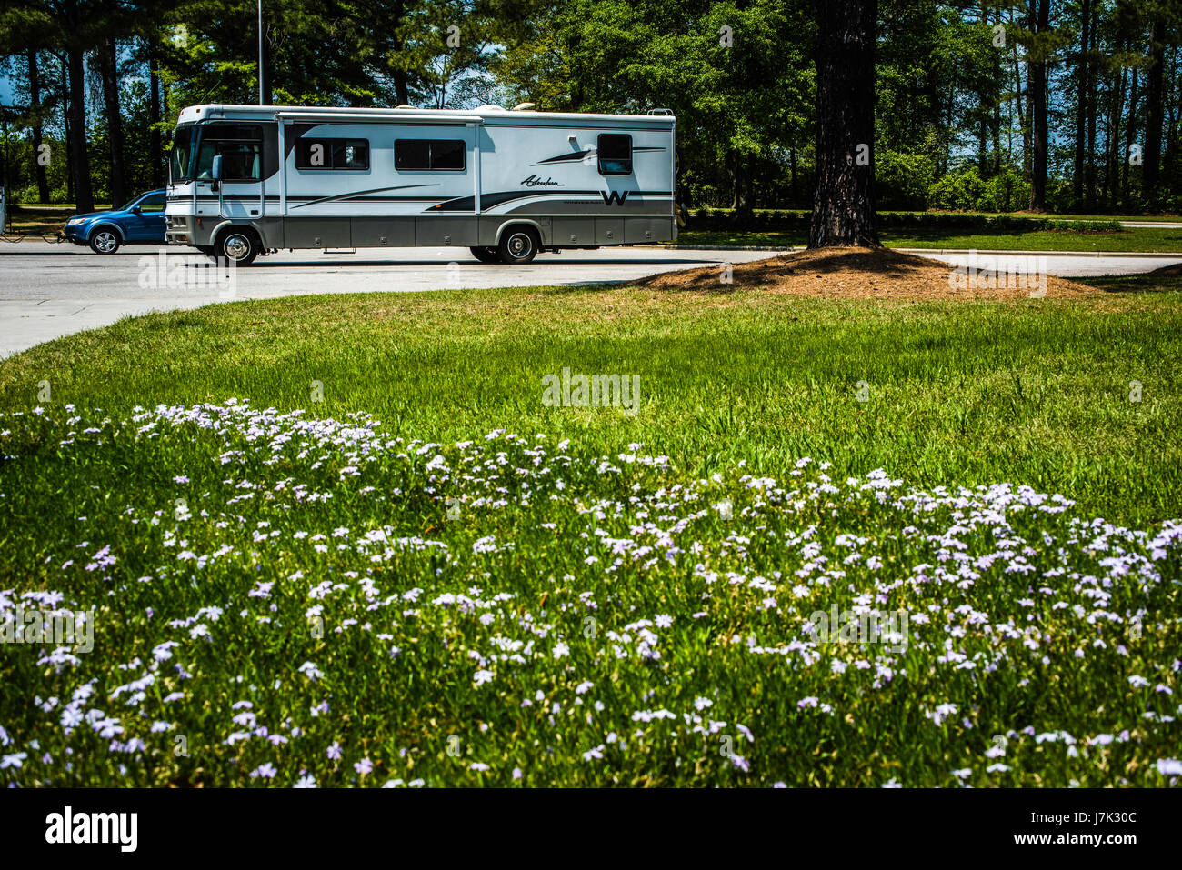 Rv camper in parking lot Stock Photo - Alamy