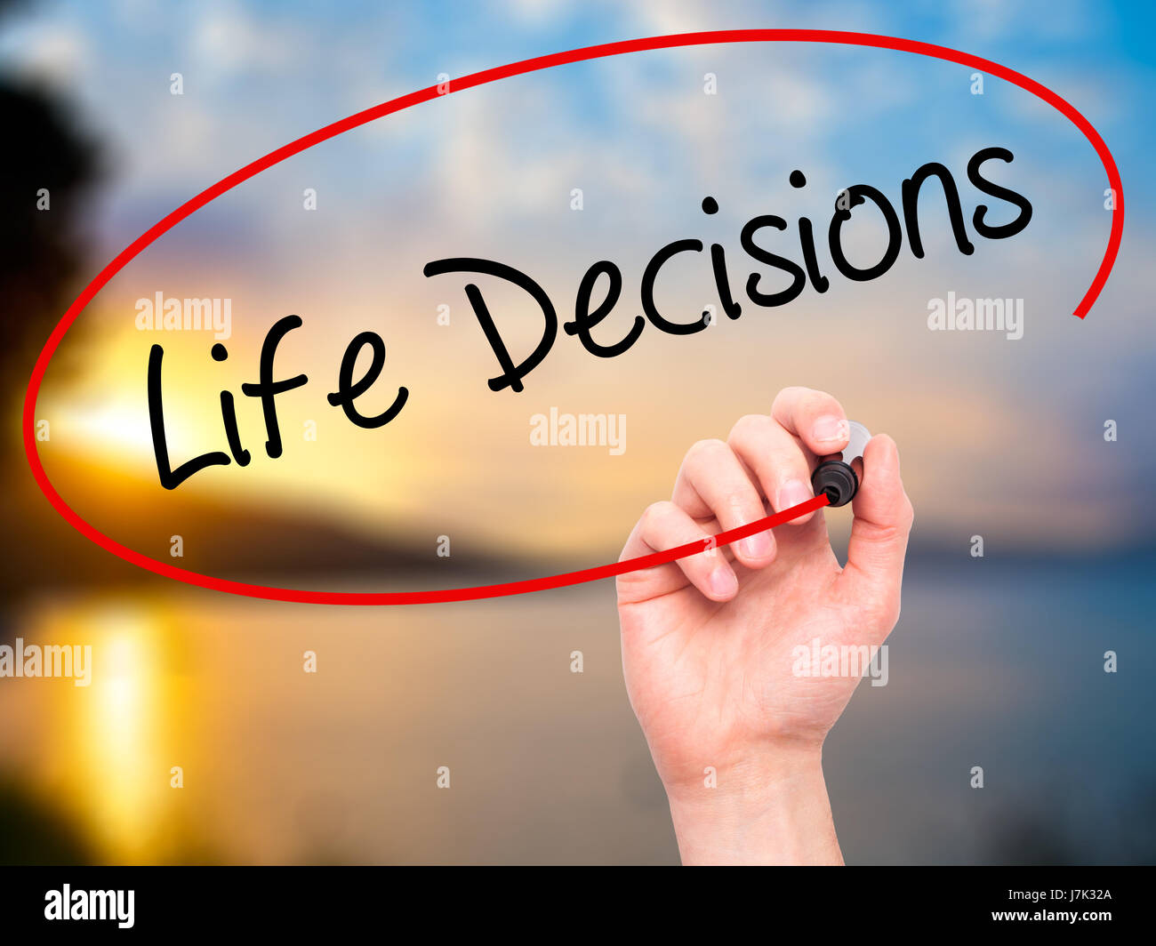 Man Hand writing Life Decisions with black marker on visual screen ...