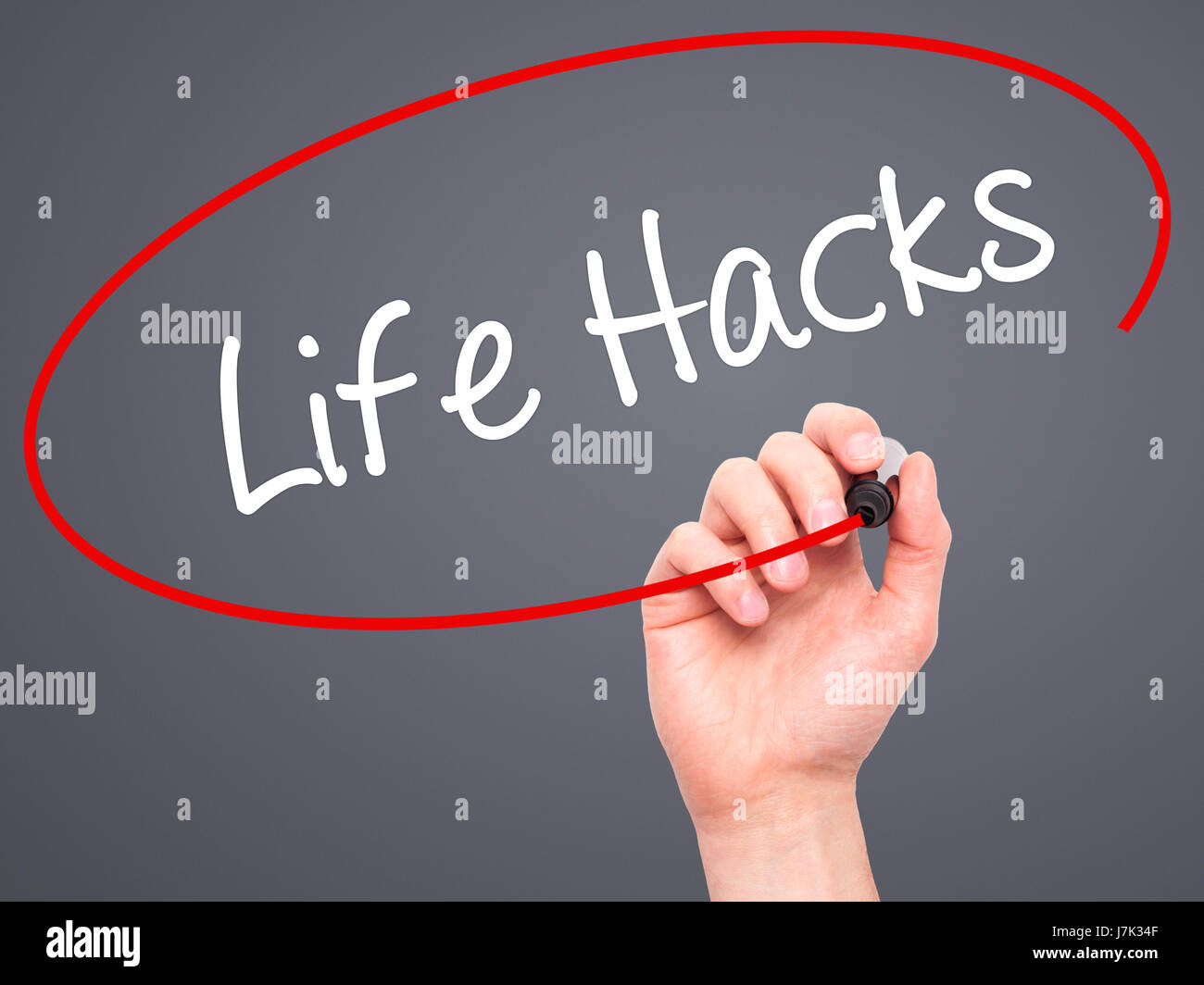 Man Hand writing Life Hacks with black marker on visual screen ...