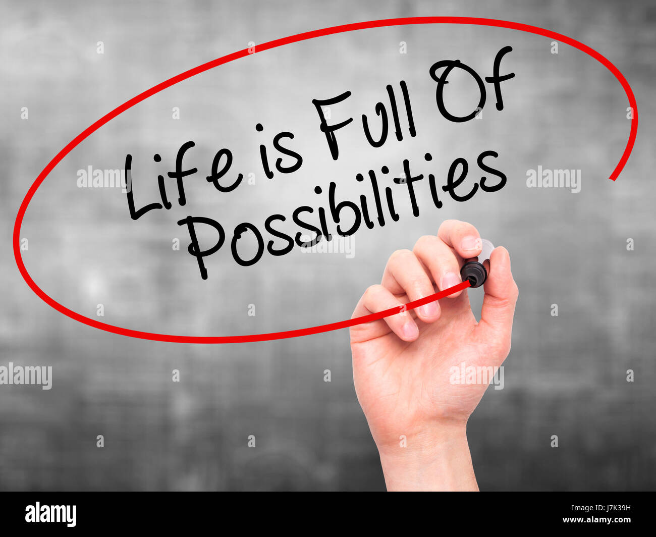 Man Hand writing Life is Full Of Possibilities with black marker on ...