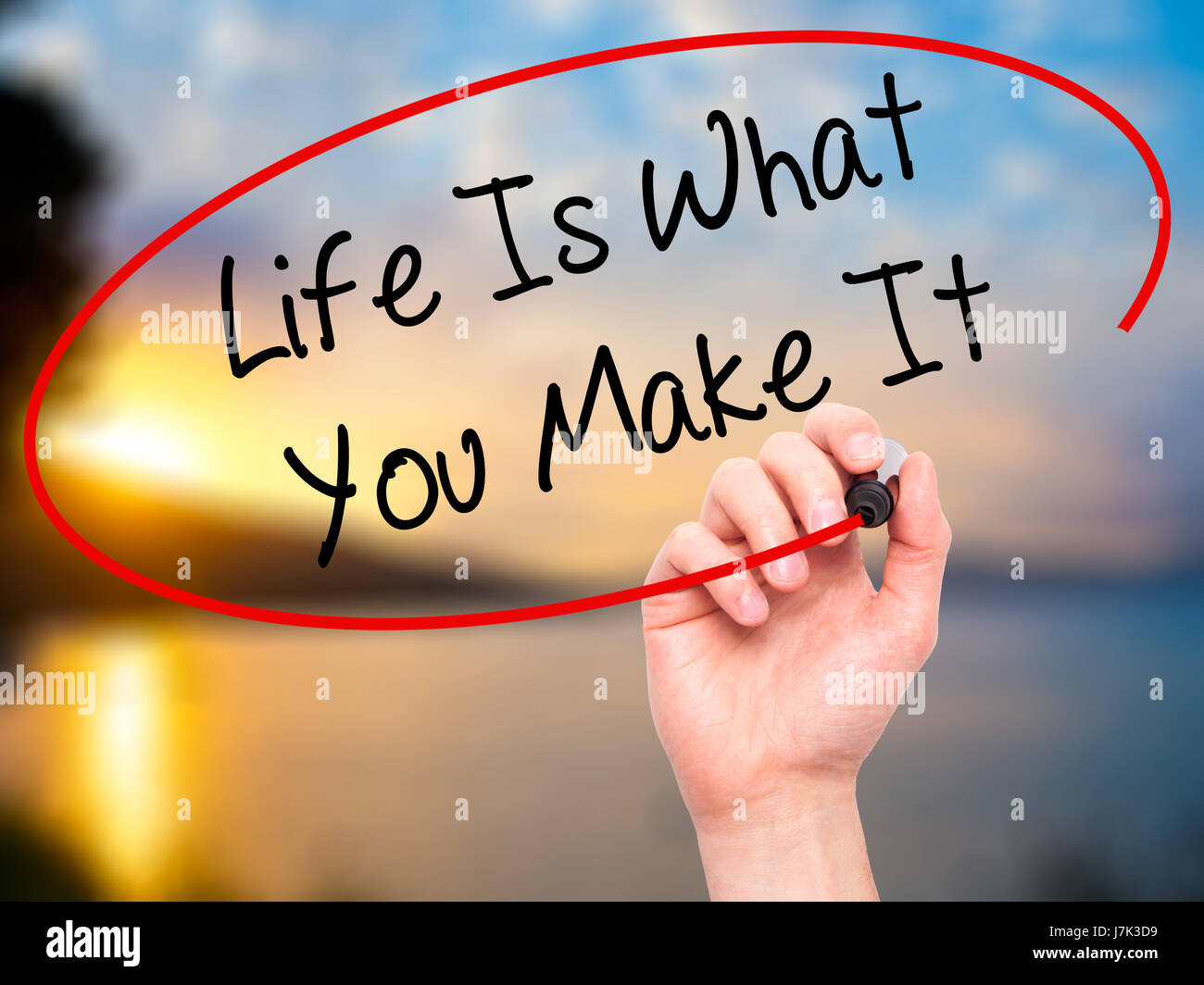 Man Hand writing Life Is What You Make It with black marker on visual ...