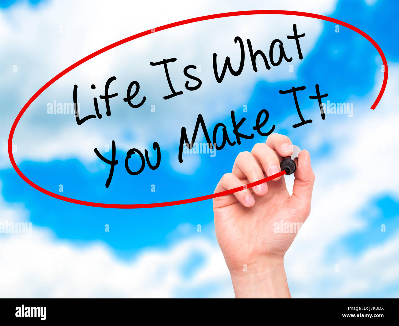 Man Hand writing Life Is What You Make It with black marker on visual ...