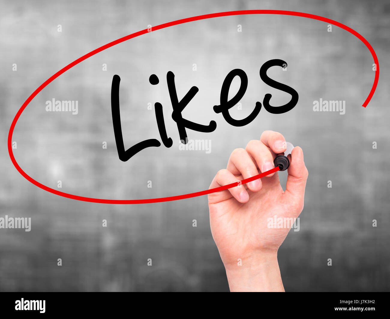 Man Hand writing Likes with black marker on visual screen. Isolated on ...