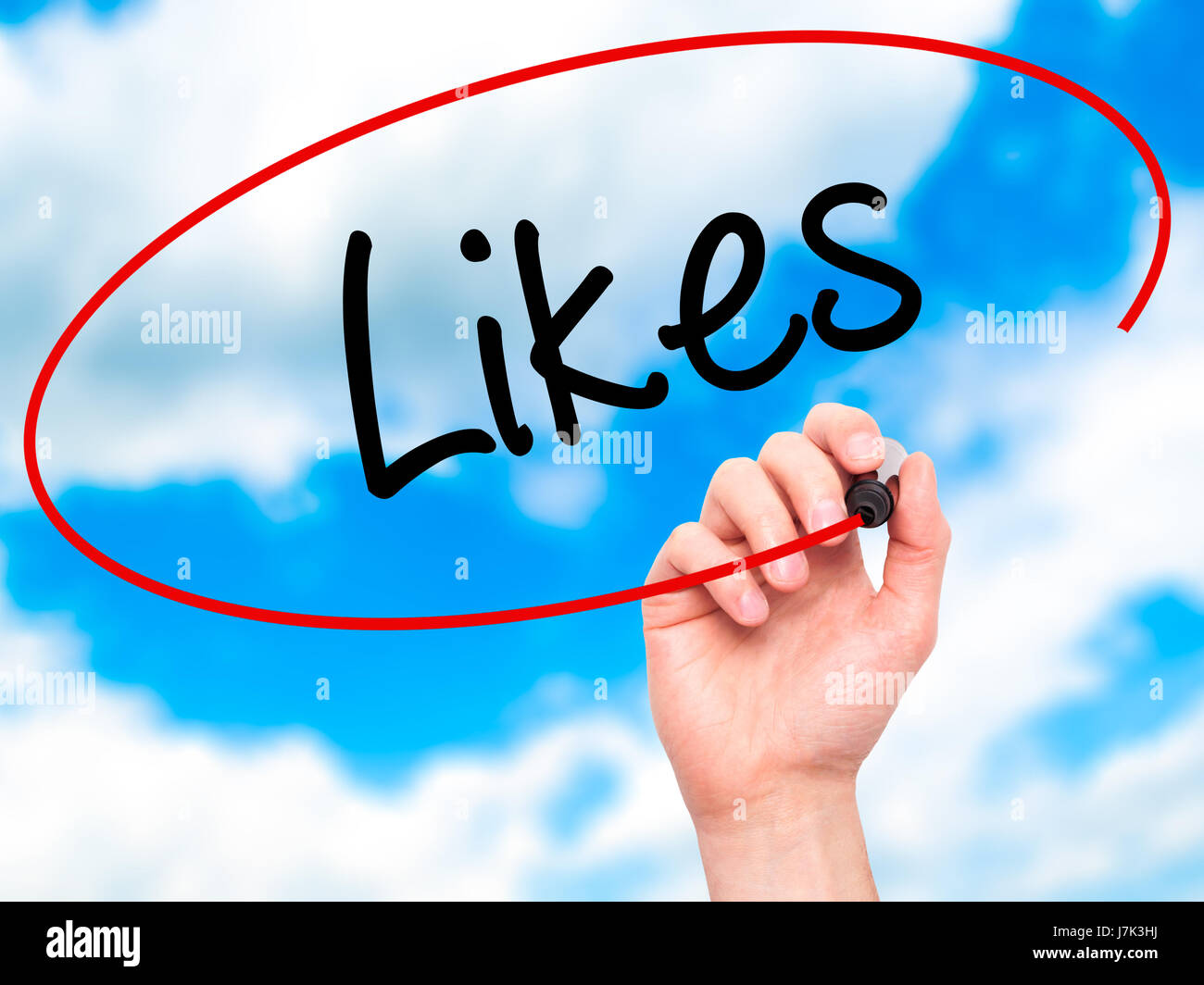 Man Hand writing Likes with black marker on visual screen. Isolated on ...
