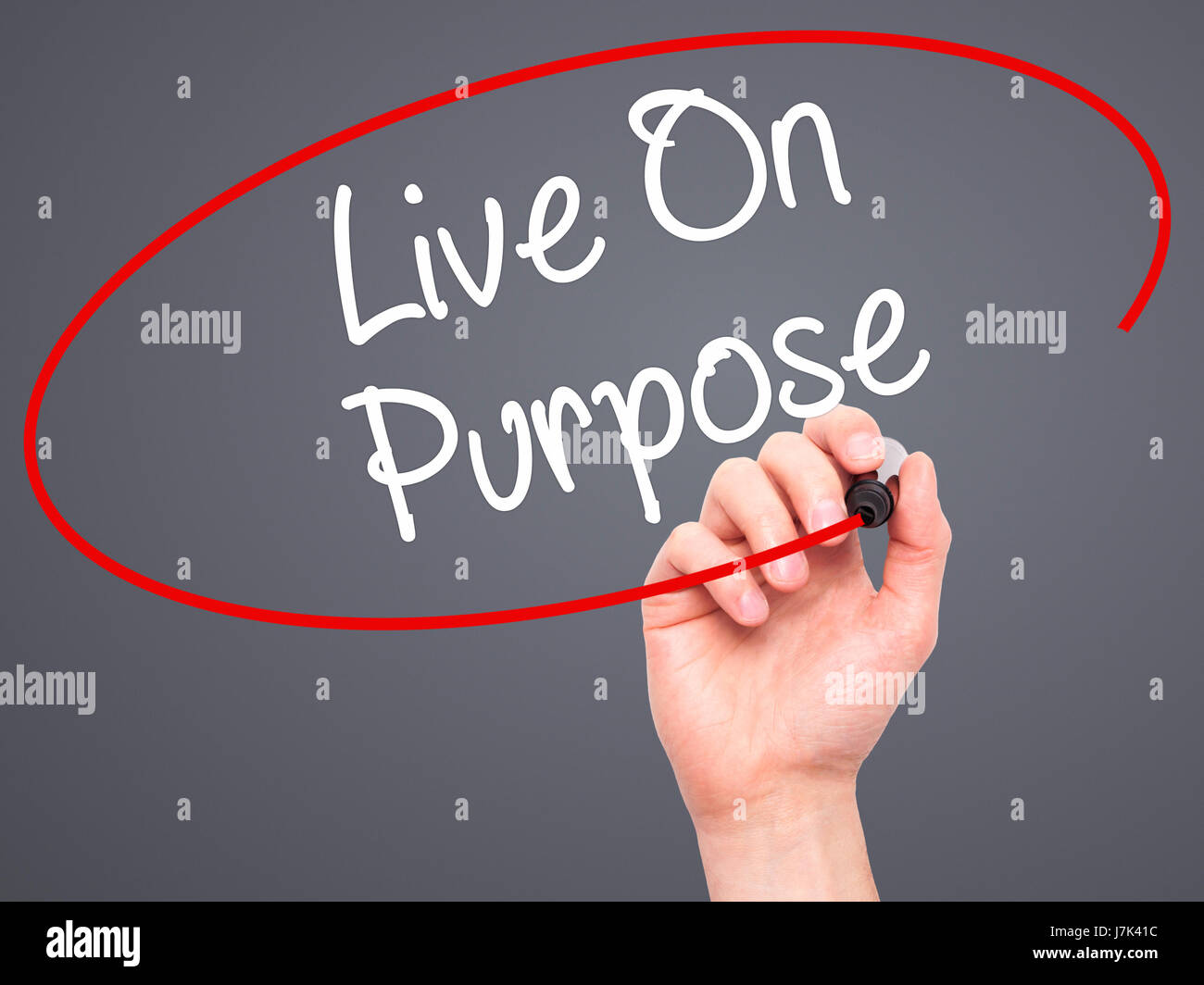Man Hand writing Live On Purpose with black marker on visual screen ...