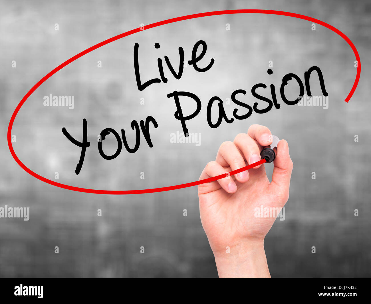Man Hand writing Live Your Passion with black marker on visual screen ...