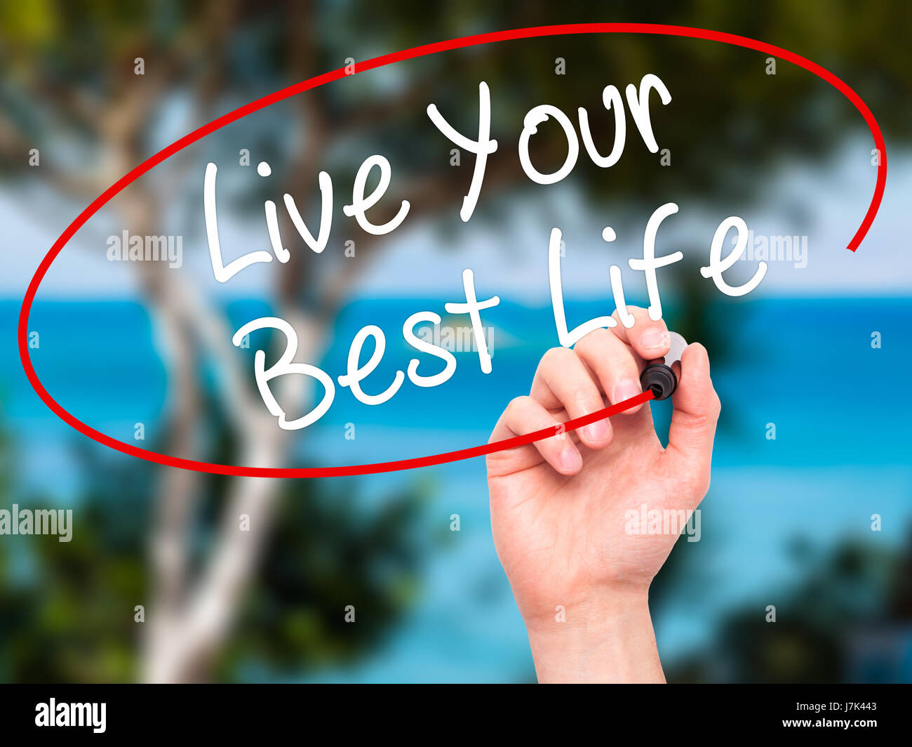 Man Hand writing Live Your Best Life with black marker on visual screen ...