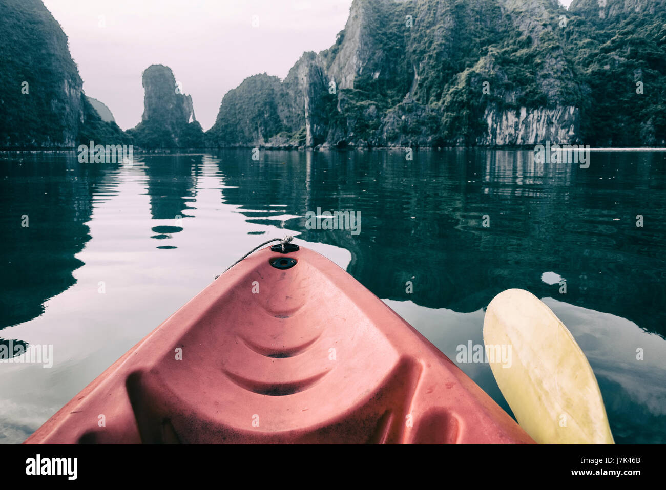 Kayaking in Ha Long Bay Stock Photo - Alamy