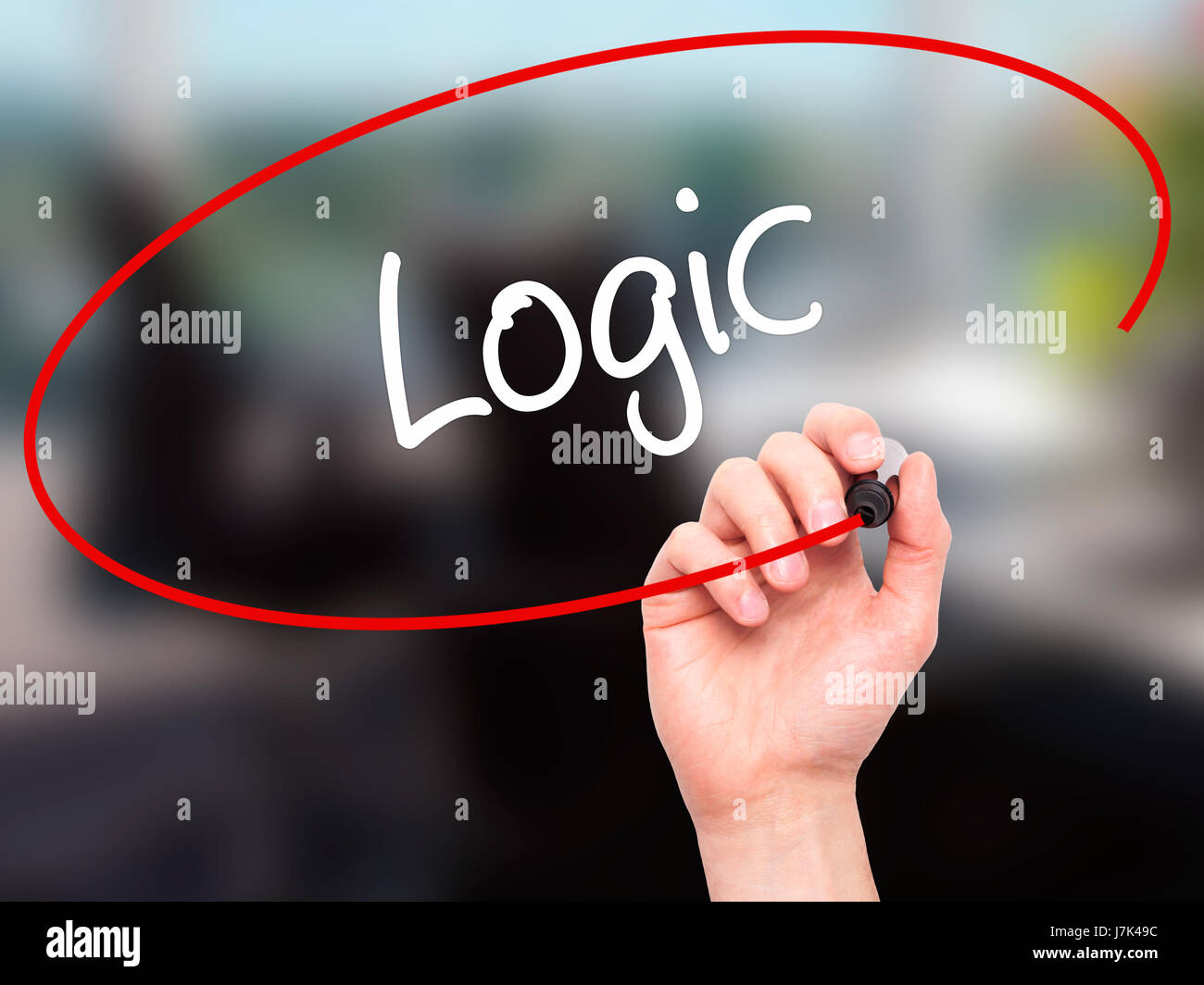 Man Hand writing Logic with black marker on visual screen. Isolated on ...