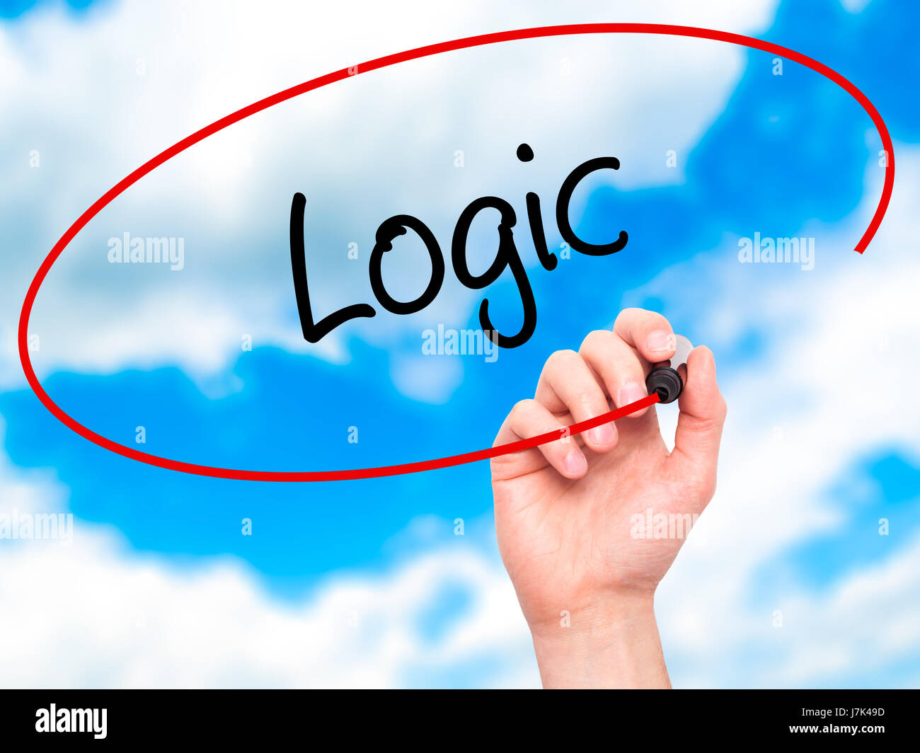 Man Hand writing Logic with black marker on visual screen. Isolated on ...