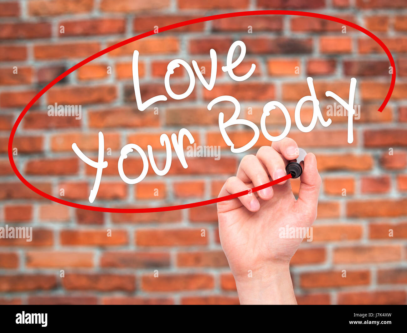 Man Hand writing Love Your Body with black marker on visual screen ...