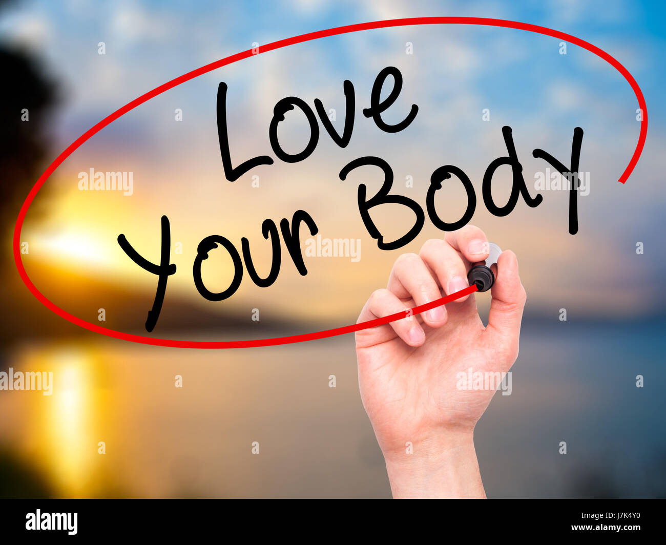 Man Hand writing Love Your Body with black marker on visual screen ...