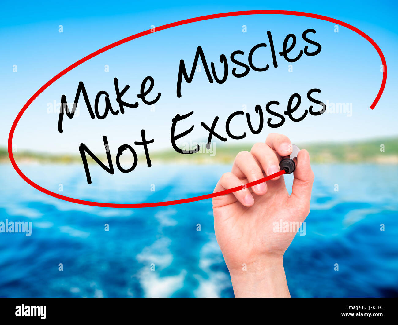 Man Hand writing Make Muscles Not Excuses with black marker on visual ...
