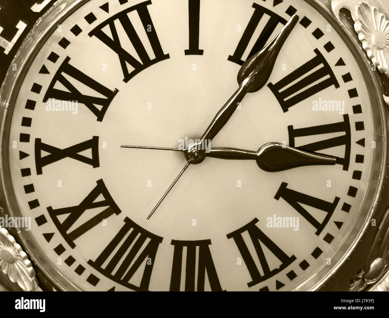 Four hands clock hi-res stock photography and images - Alamy