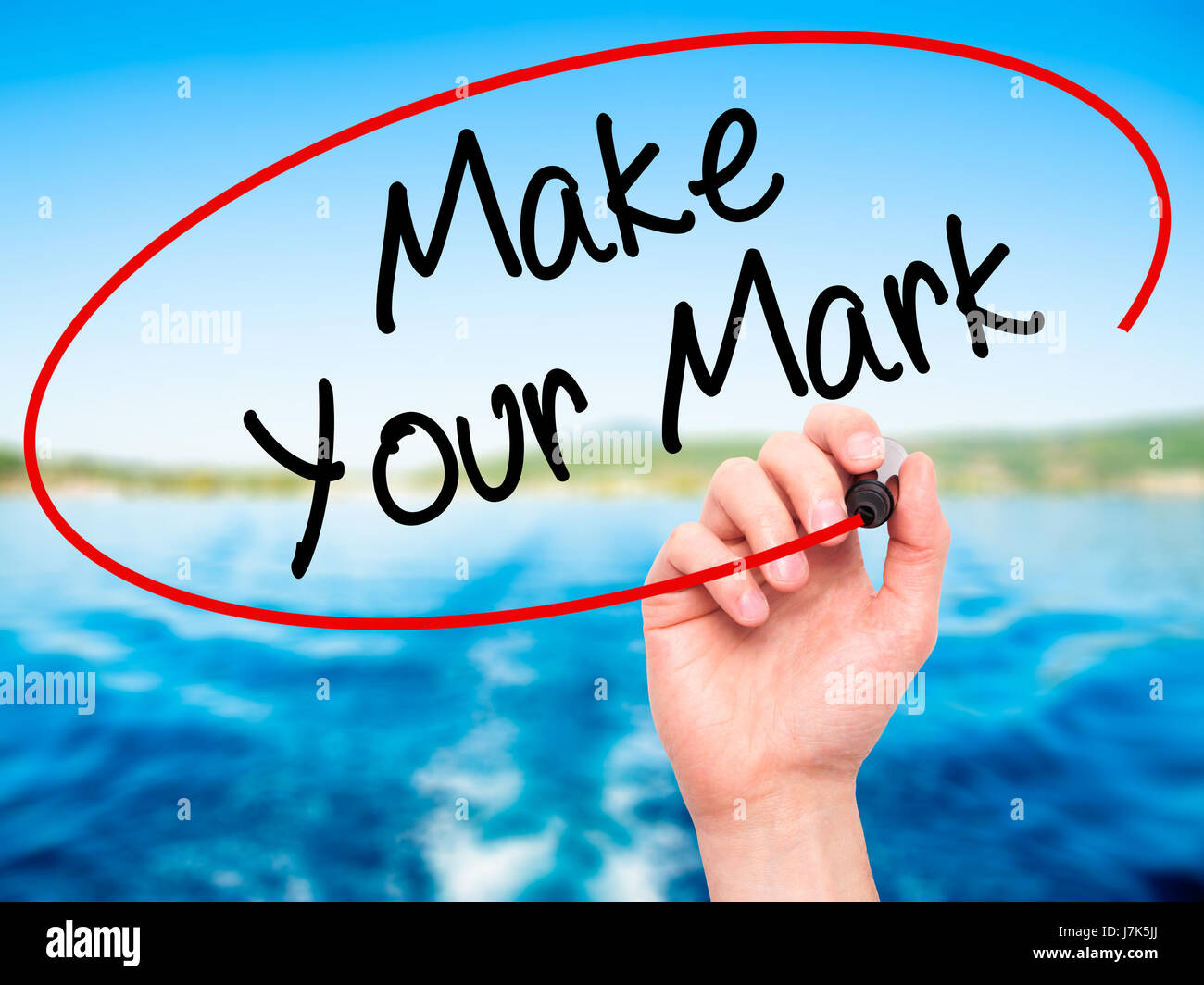 Man Hand writing Make Your Mark with black marker on visual screen ...