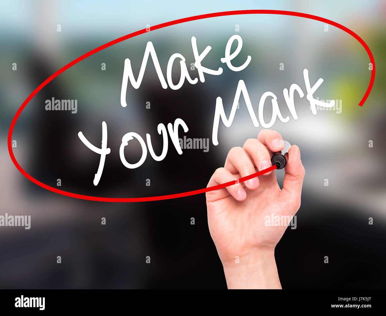 Man Hand writing Make Your Mark with black marker on visual screen ...