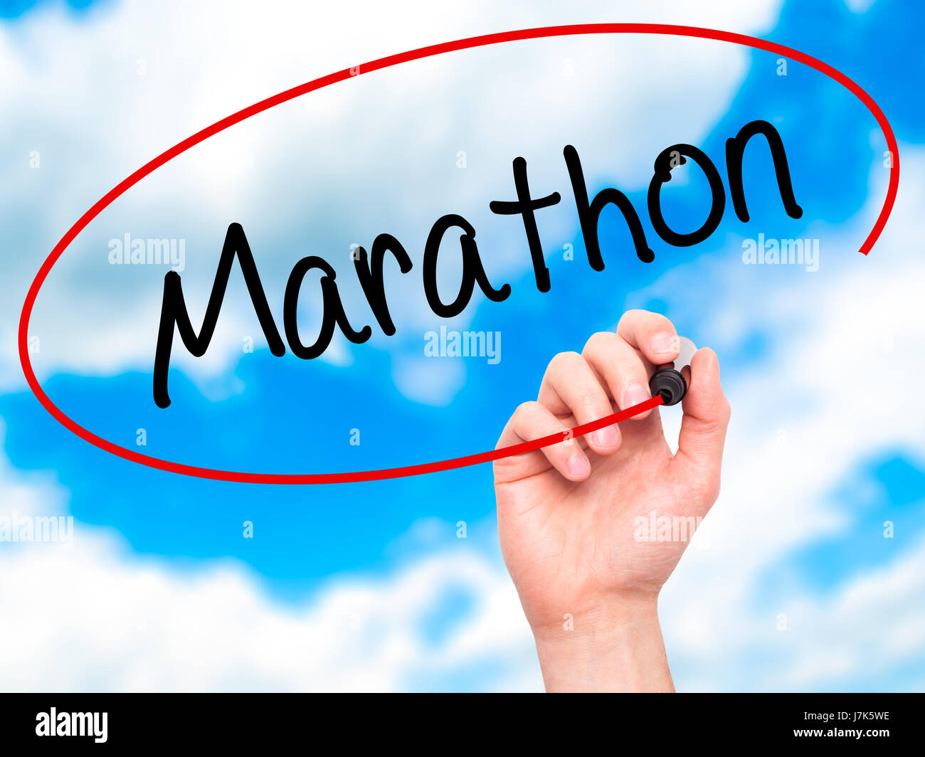 Man Hand writing Marathon with black marker on visual screen. Isolated ...