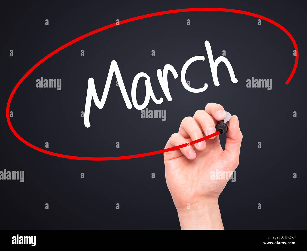 Man Hand writing March with black marker on visual screen. Isolated on ...
