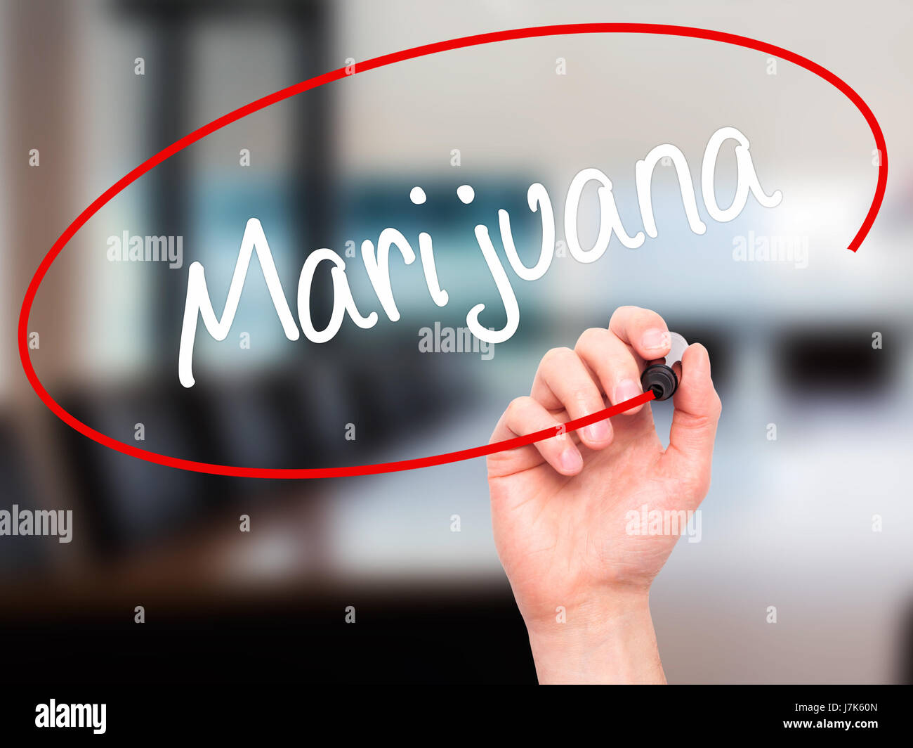 Man Hand writing Marijuana with black marker on visual screen. Isolated ...