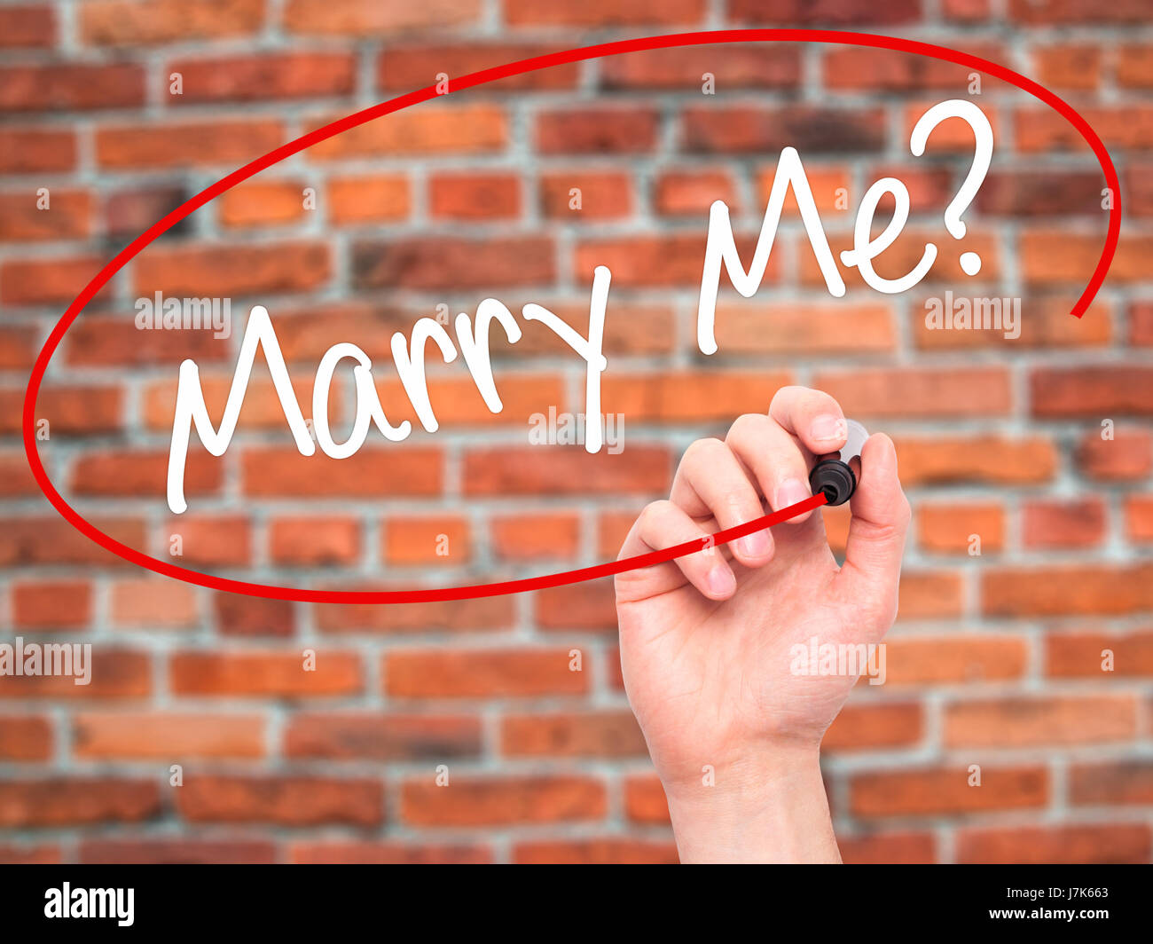 Man Hand writing Marry Me? with black marker on visual screen. Isolated ...
