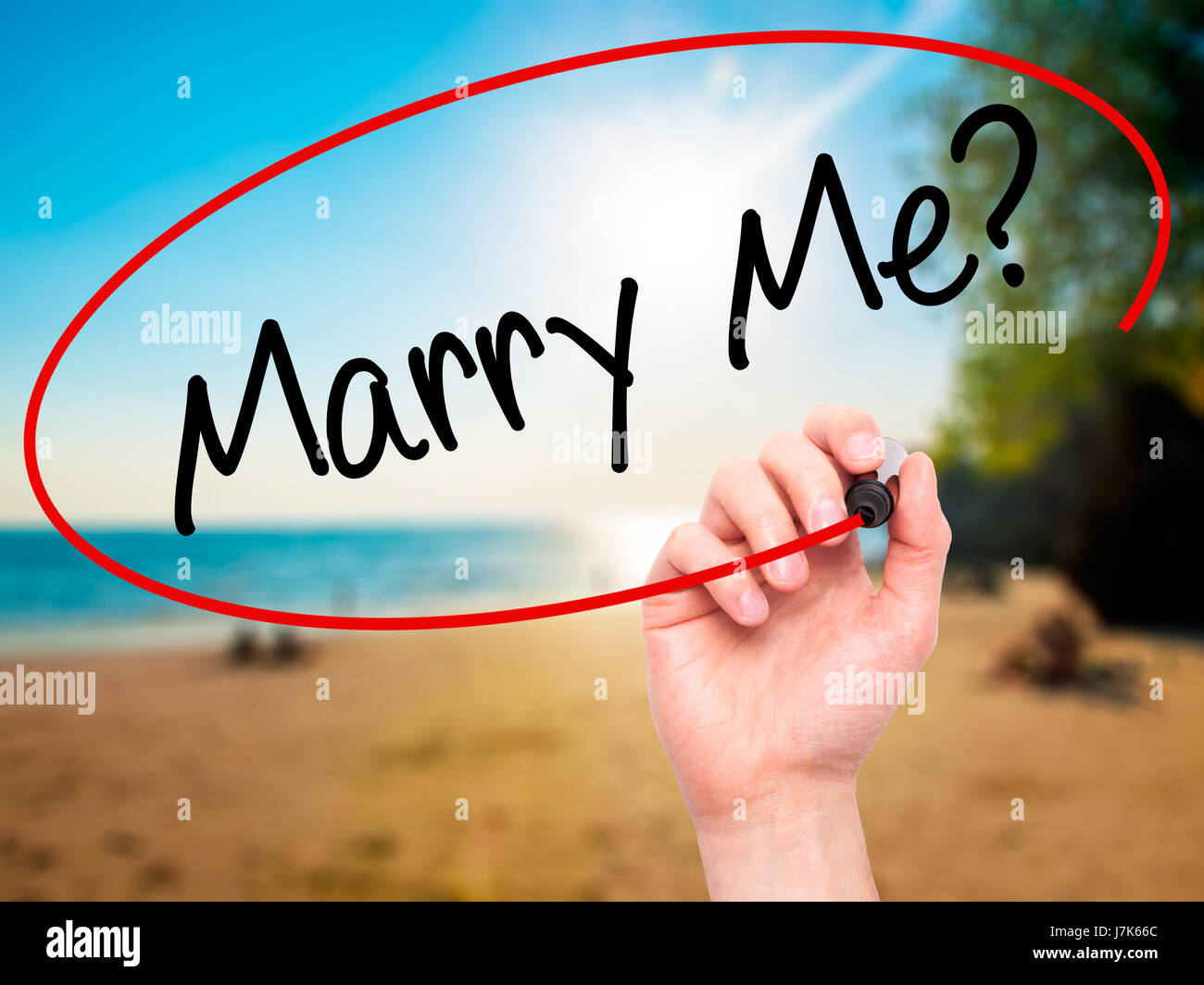 Man Hand writing Marry Me? with black marker on visual screen. Isolated ...