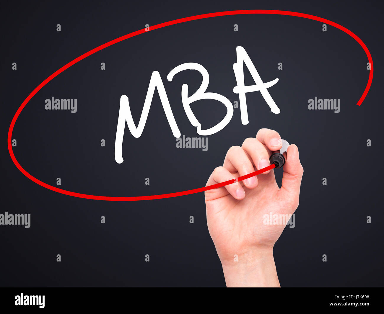 Man Hand writing MBA with black marker on visual screen. Isolated on ...