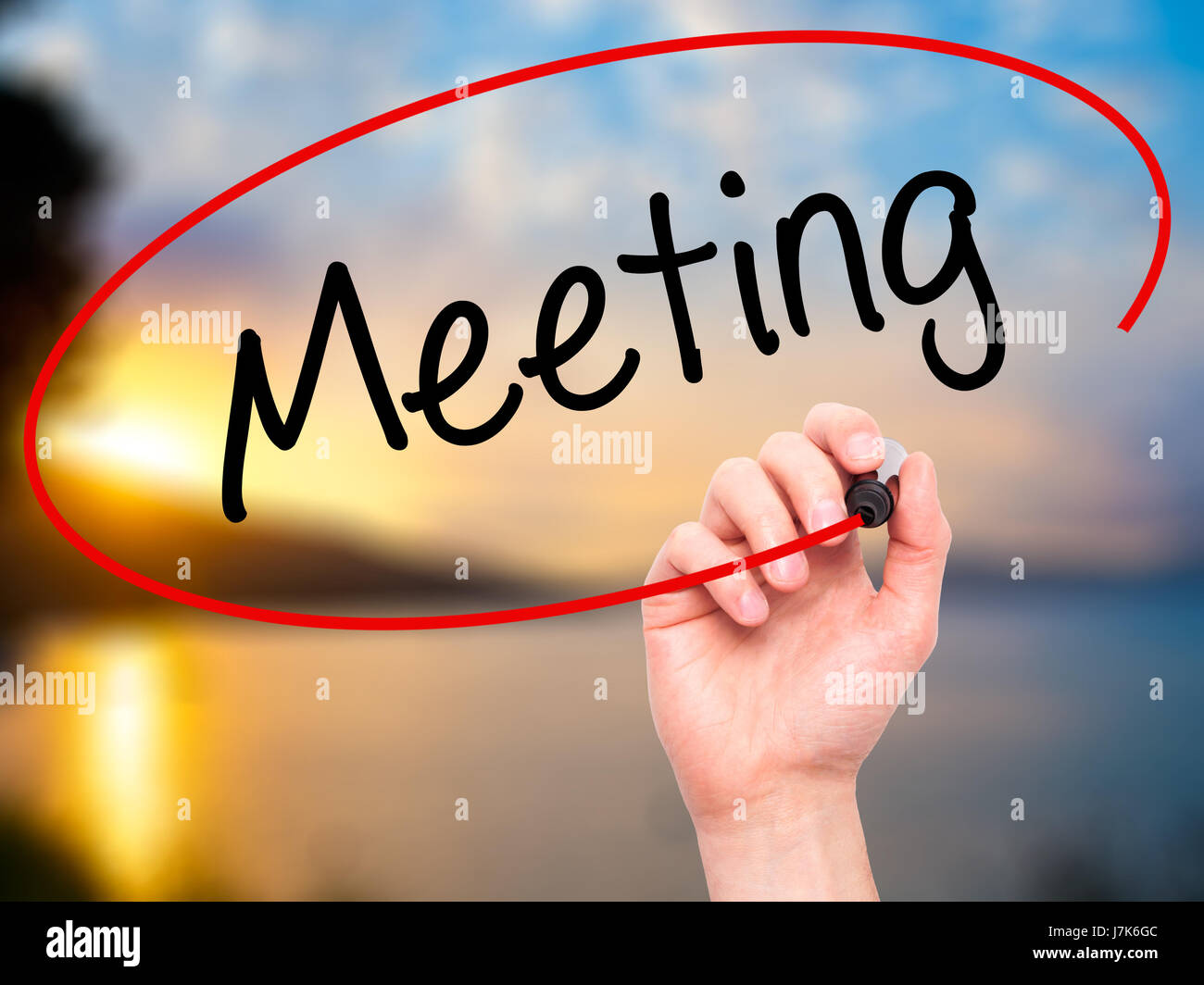 Man Hand writing Meeting with black marker on visual screen. Isolated ...