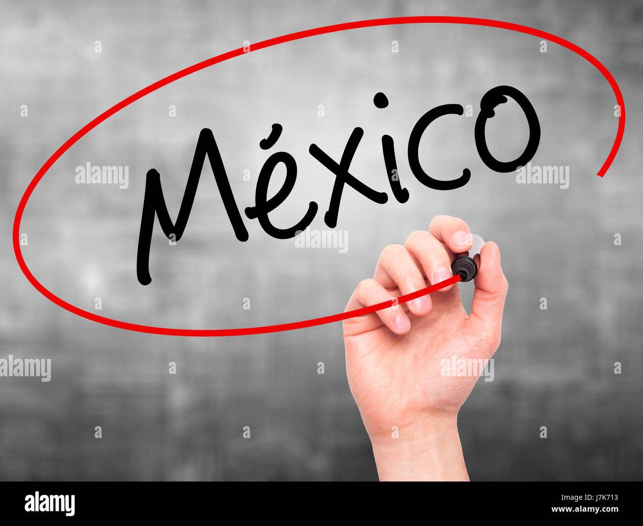 Man Hand writing Mexico (In Spanish) with black marker on visual screen ...