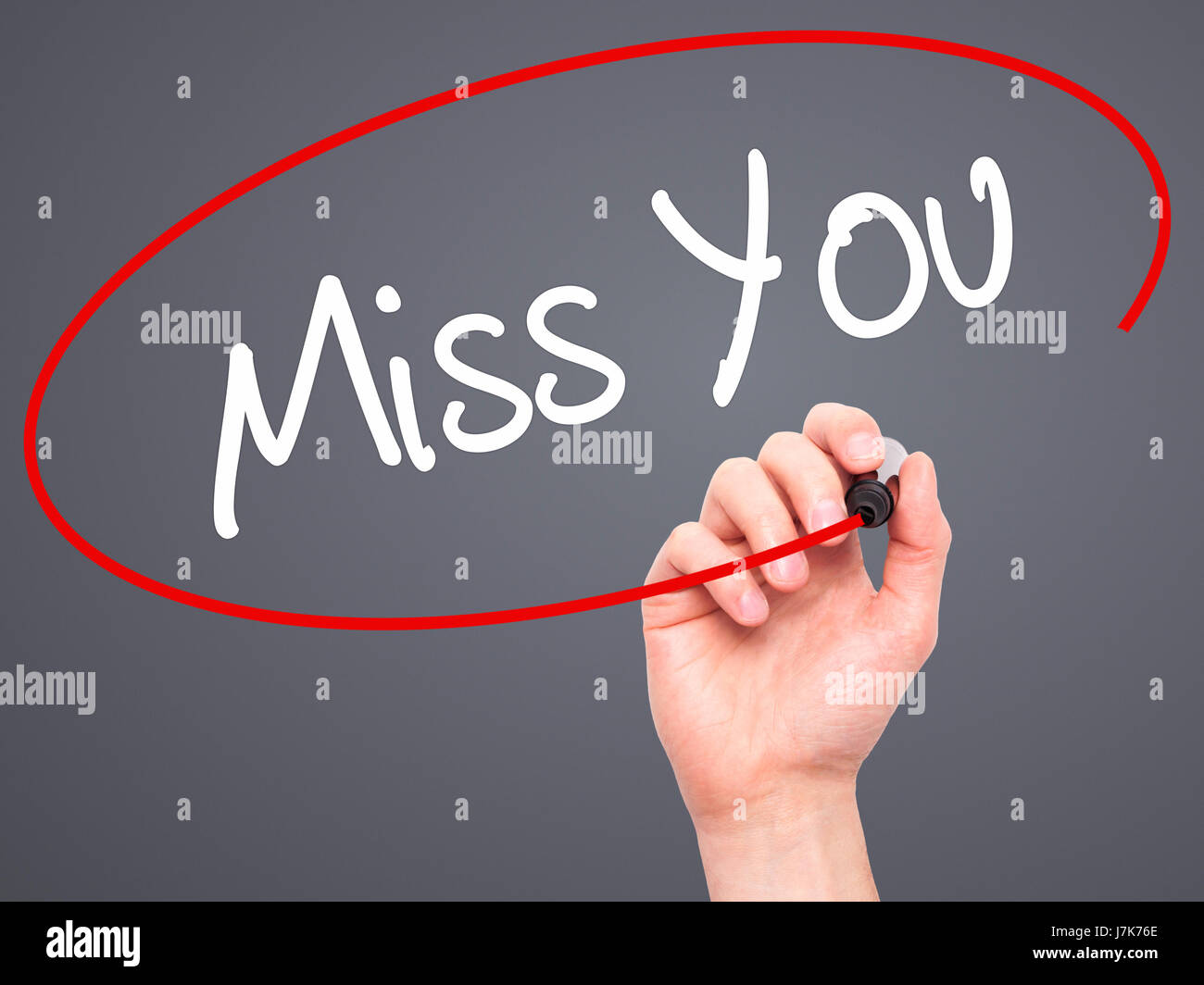 Man Hand writing Miss You with black marker on visual screen. Isolated ...