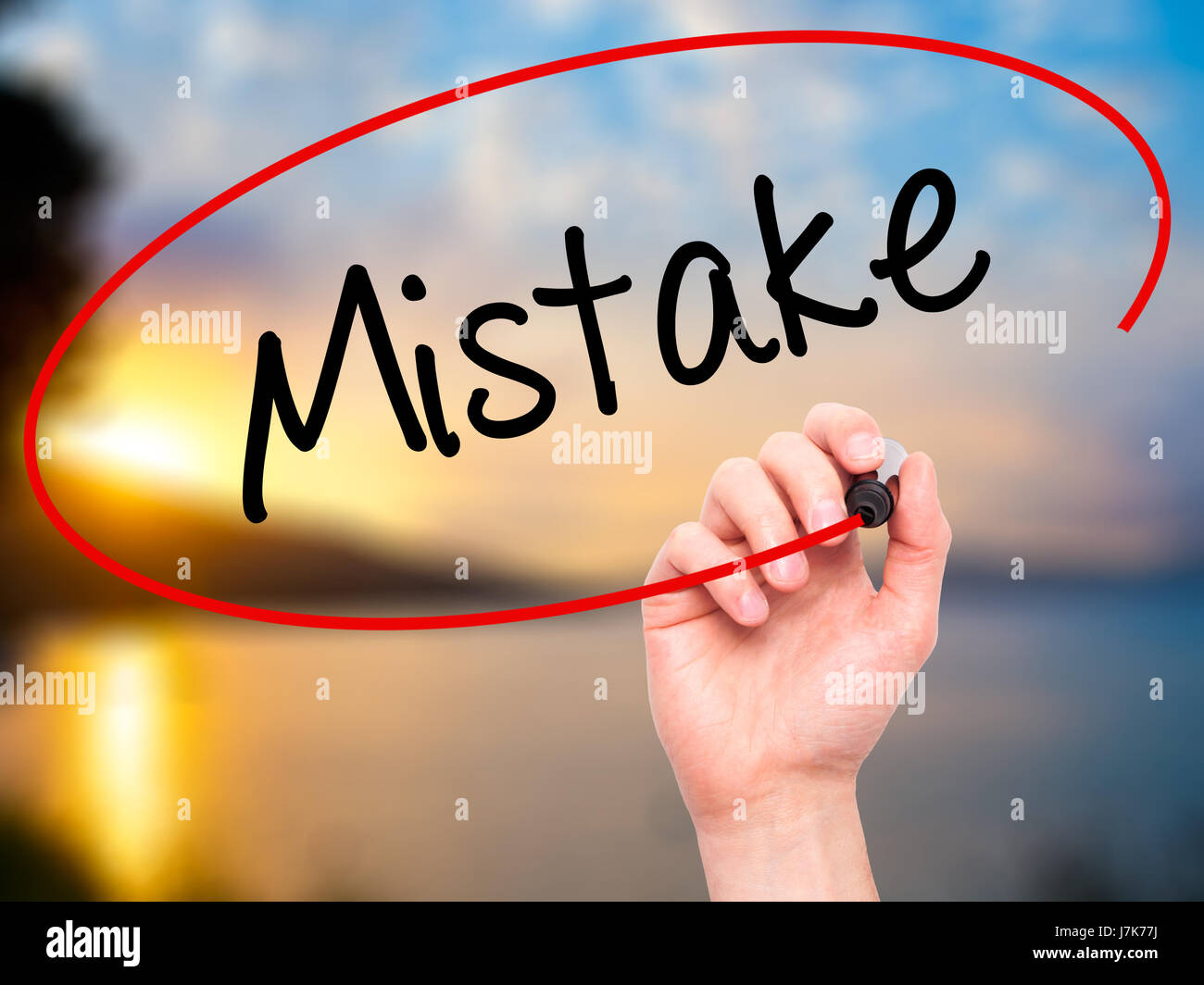 Man Hand writing Mistake with black marker on visual screen. Isolated ...