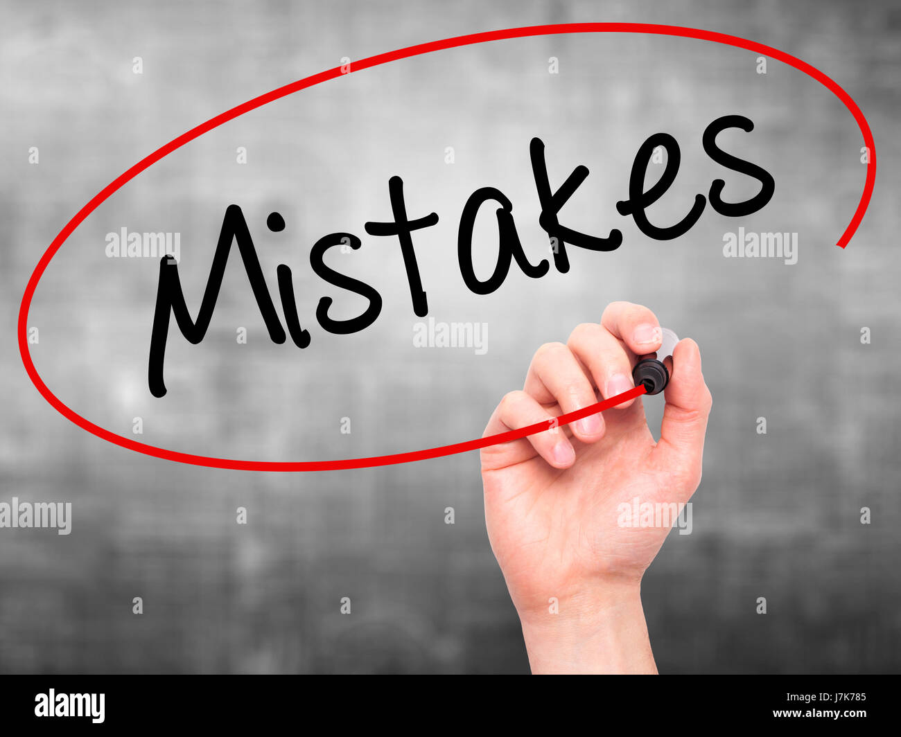 Man Hand writing Mistakes with black marker on visual screen. Isolated ...