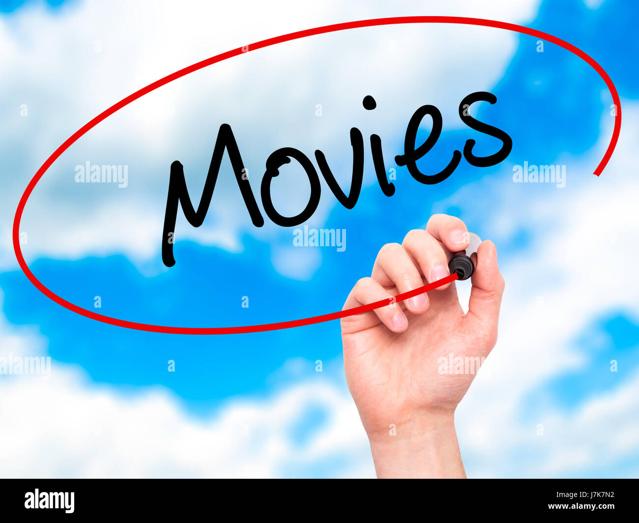 Man Hand writing Movies with black marker on visual screen. Isolated on ...