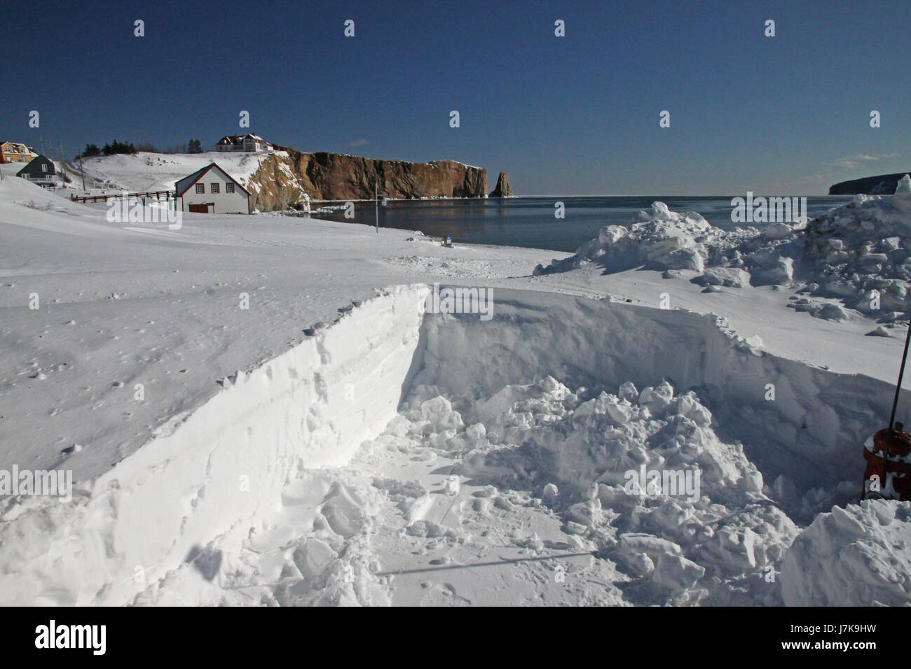 The image shows a view of Perce, a town located in Quebec, Canada ...