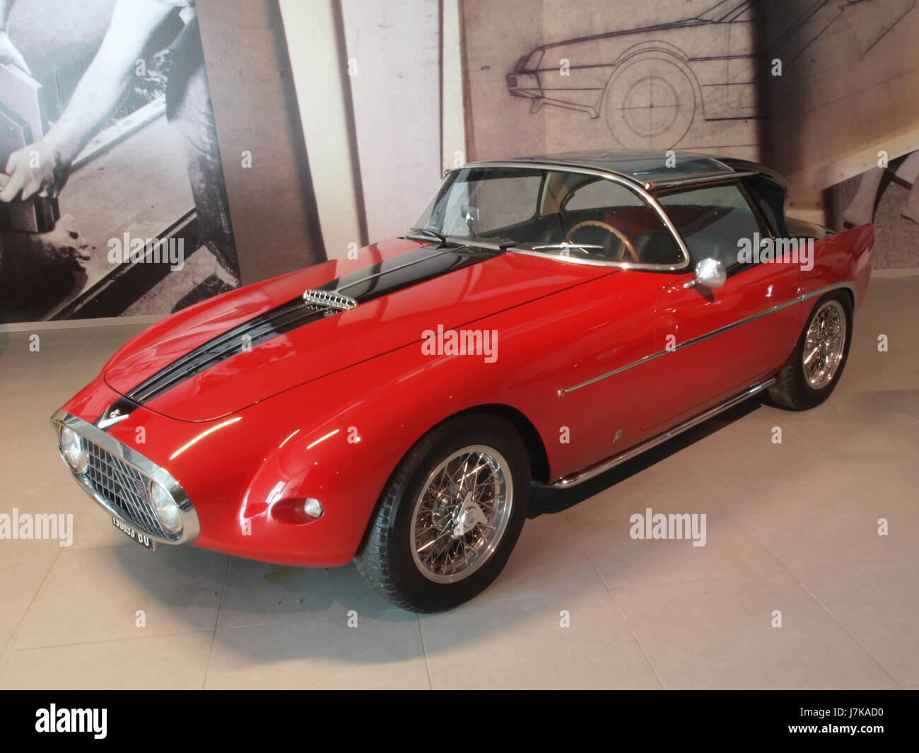 This image features a 1953 Fiat 8V Demon Rouge, a classic Italian ...