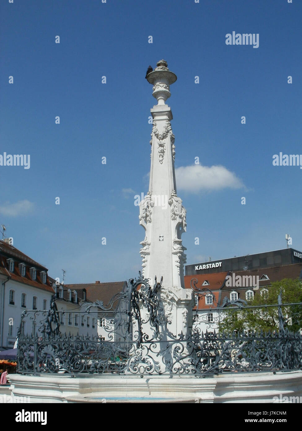 This image shows the St. Johanner Marktbrunnen, a fountain located in ...
