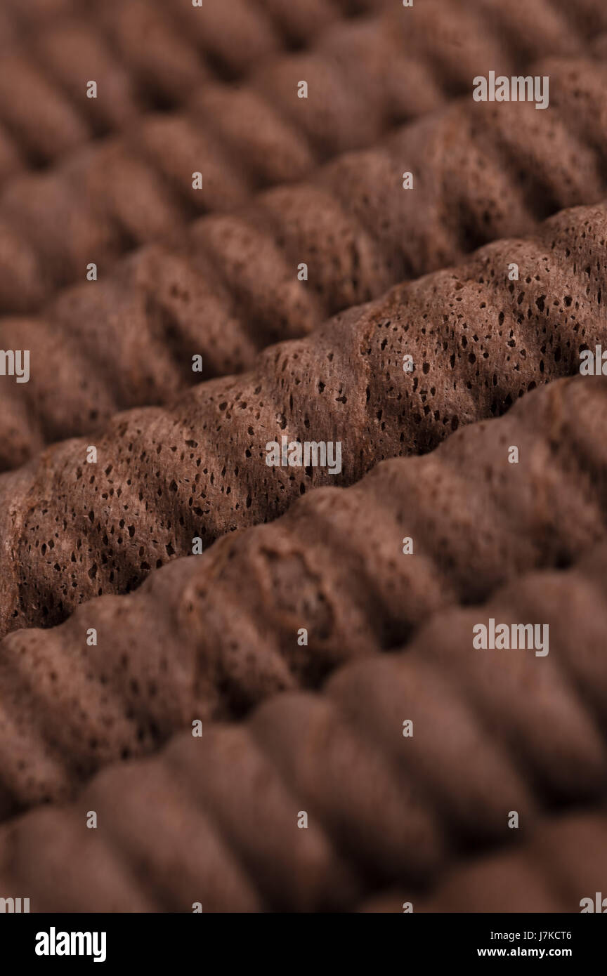 Close up of chocolate waffle rolls in a row Stock Photo - Alamy