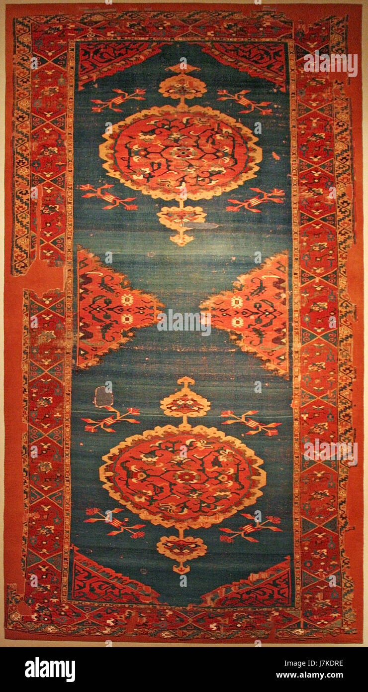 This carpet, featuring a double medallion design, is a representative ...