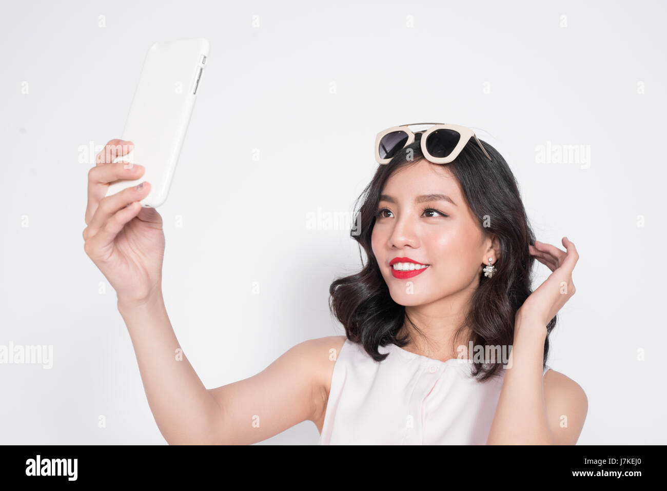 Portrait of beautiful asian fashionable girl taking selfie Stock Photo - Alamy