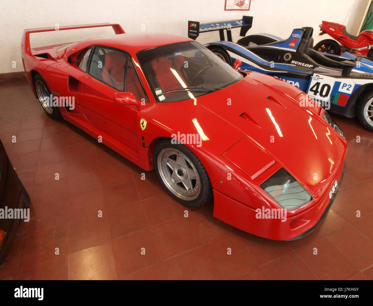 The 1990 Ferrari F40 is a legendary sports car, featuring a V8 engine ...