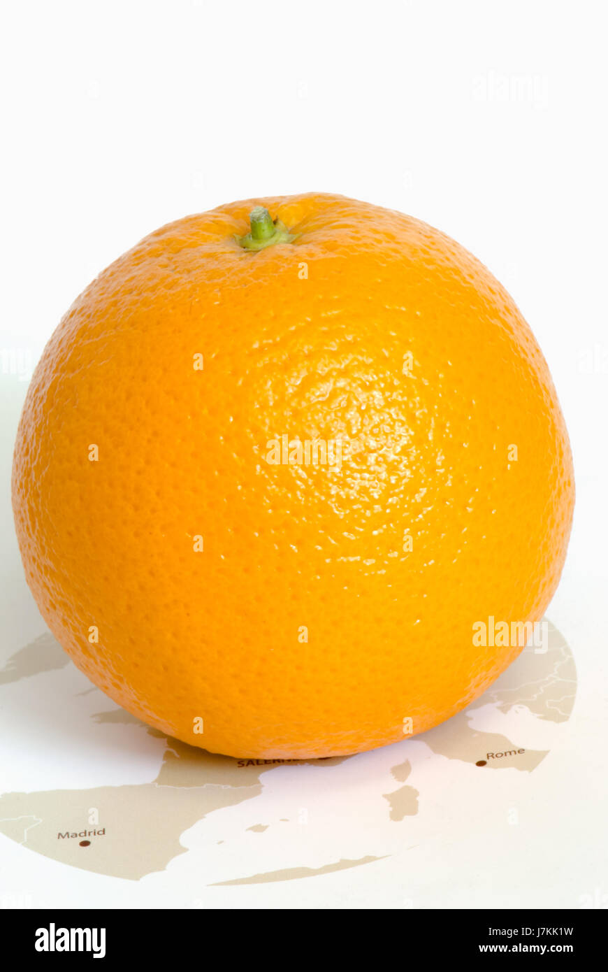 orange object single ripe fruit half and map atlas map of the world ...