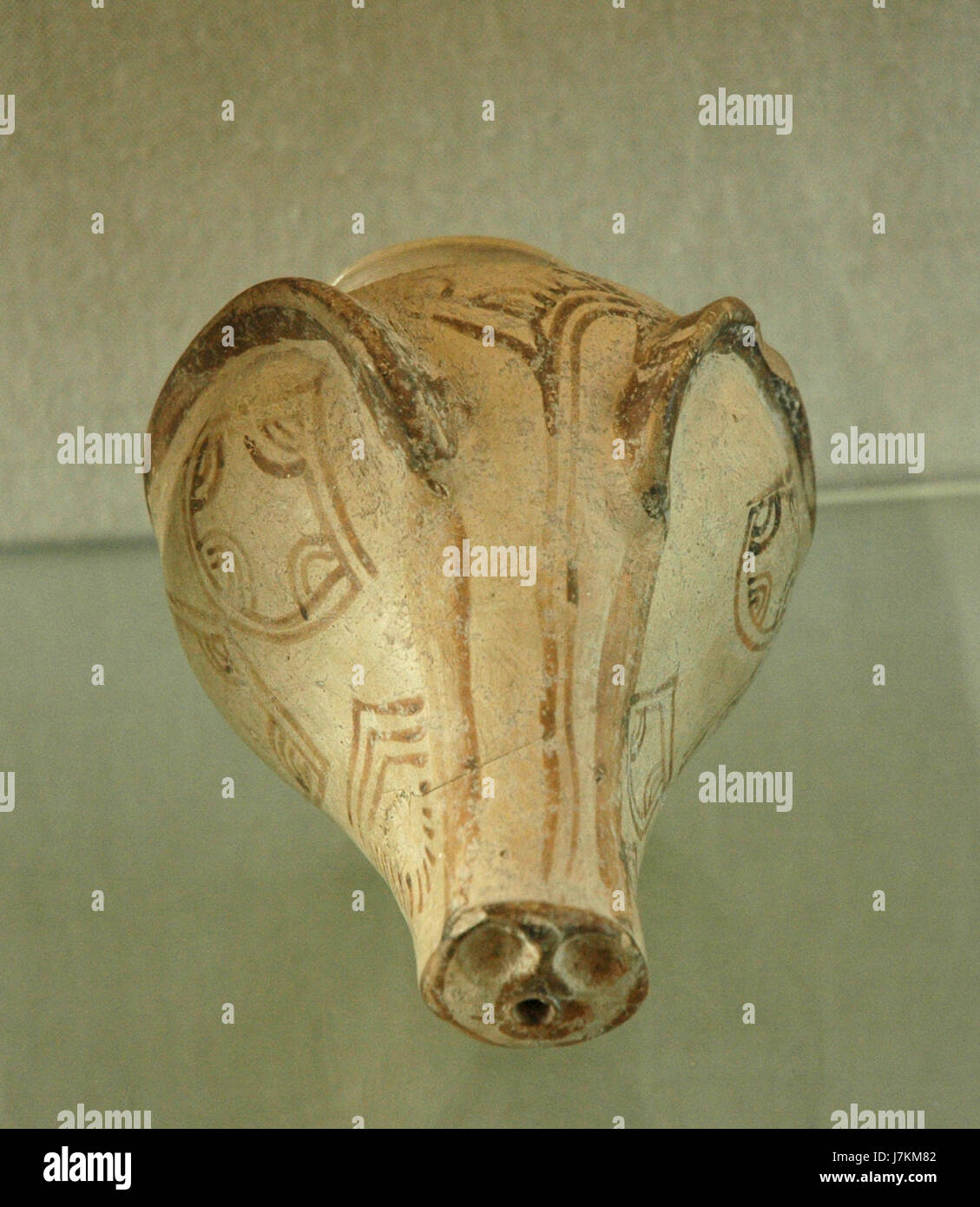 A Mycenaean ceramic vessel in the shape of a boar's head, imported by ...