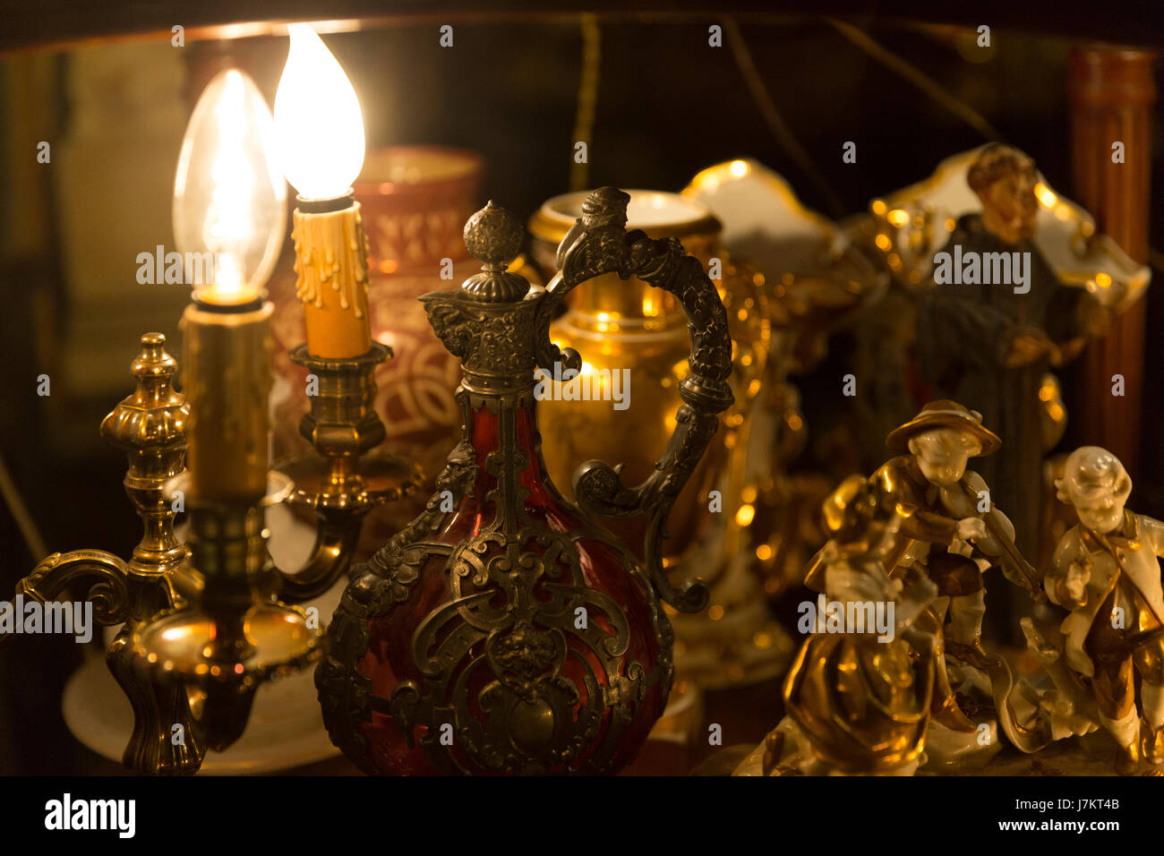 Charming antique jug & lighting for sweet home Stock Photo - Alamy
