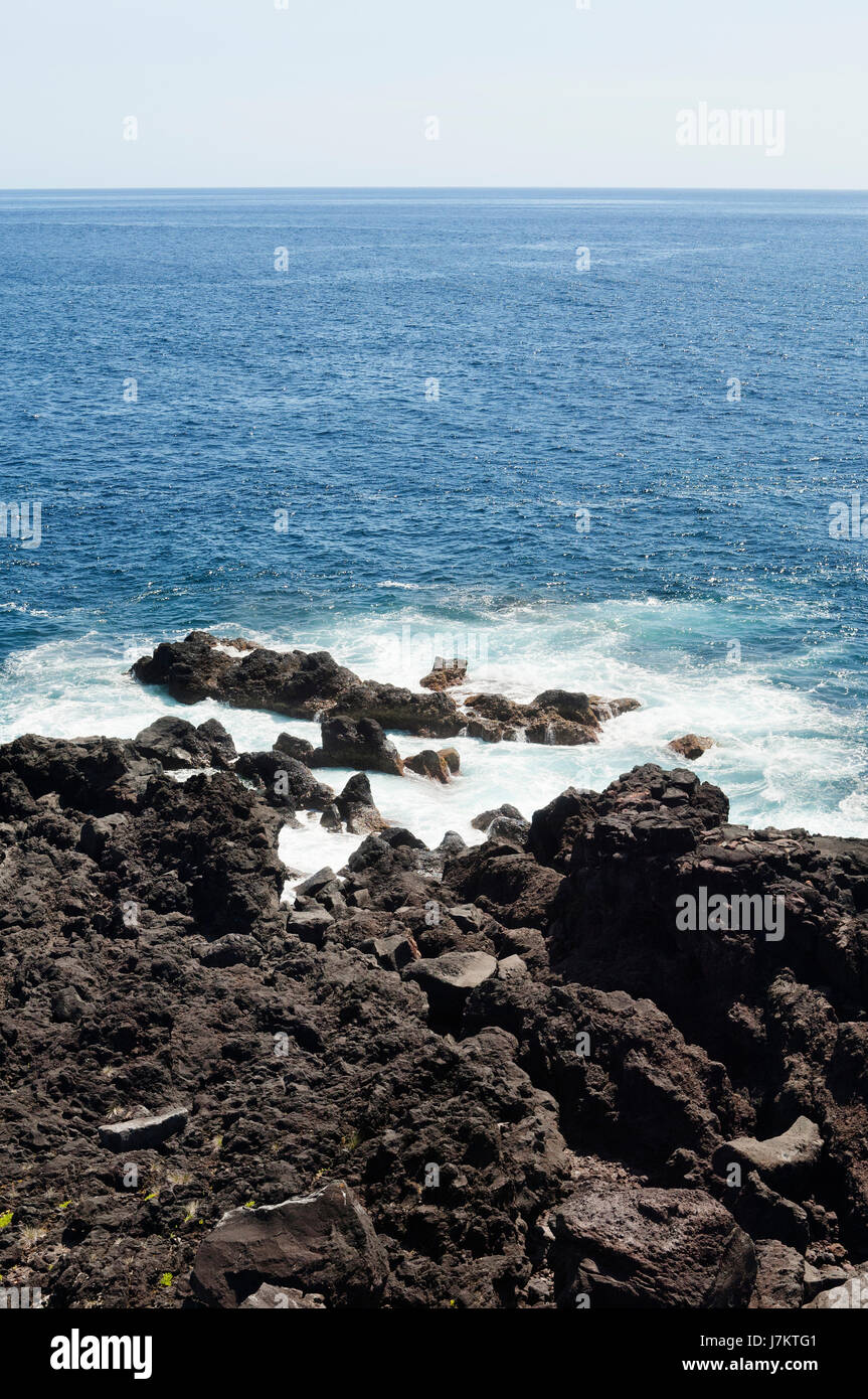 rock coast cliff basalt azores volcanic salt water sea ocean water blue ...