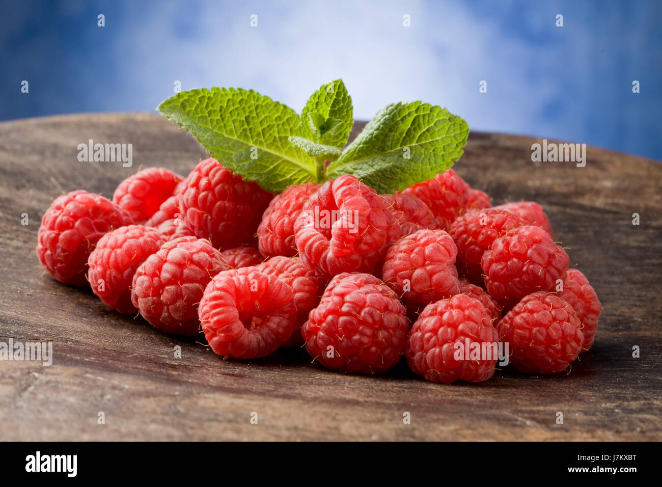fruit berries mint wooden board raspberries fresh vegetarian food ...